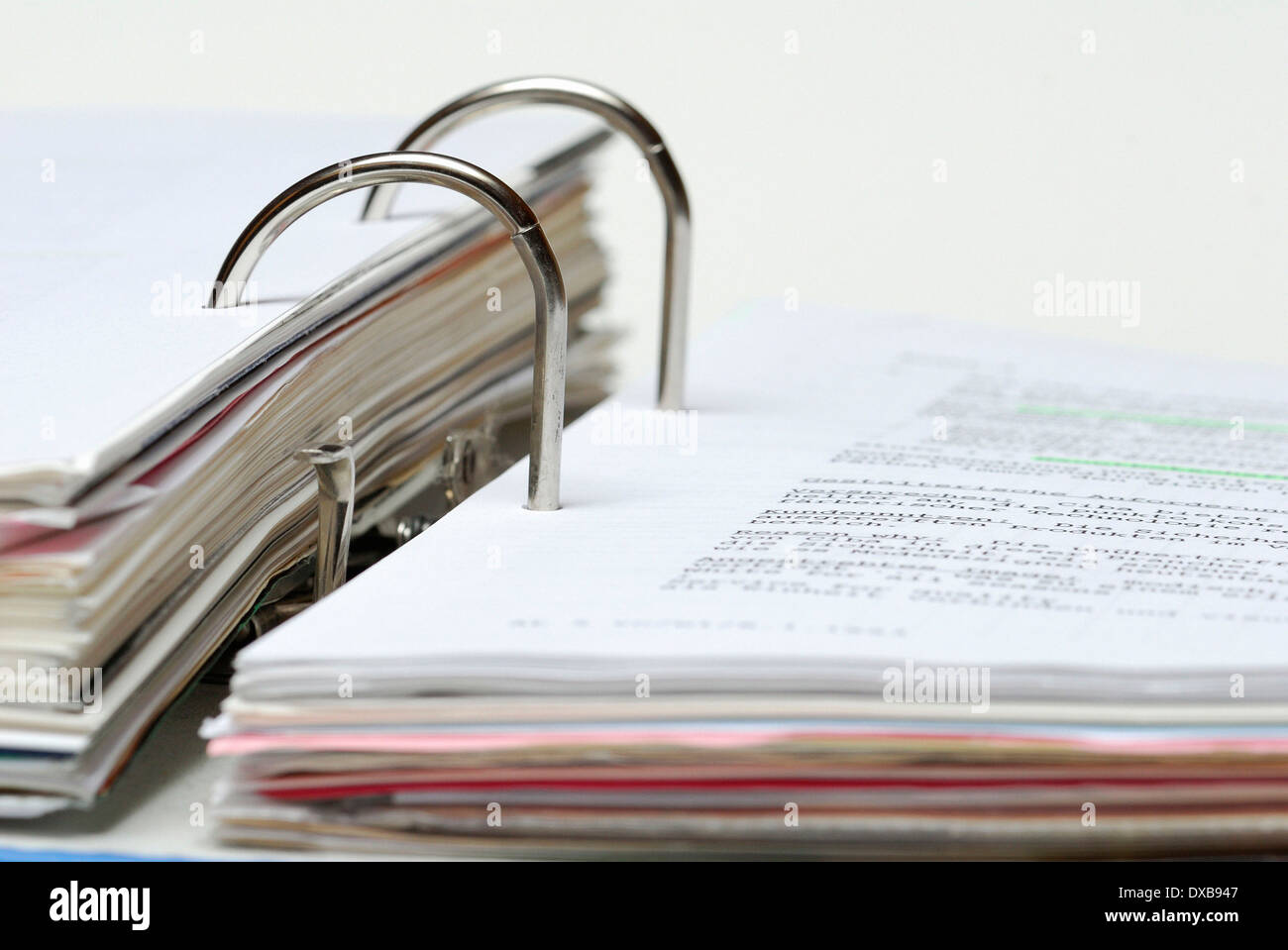 Opened filing folder with filed away documents hi-res stock photography ...