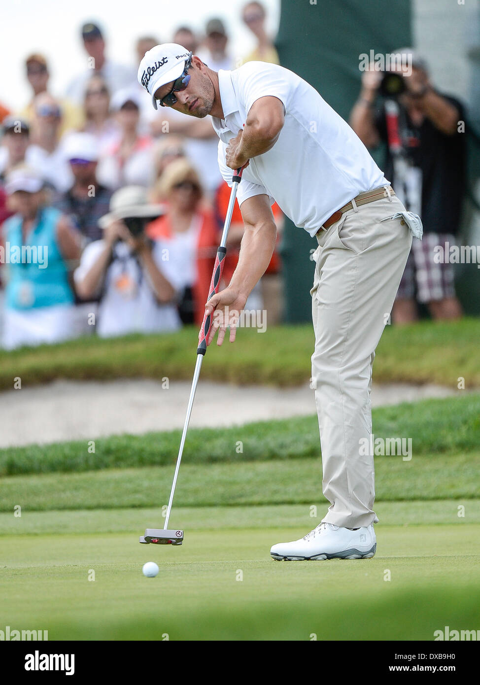 Orlando, Florida, USA. 22nd Mar, 2014. Adam Scott eyes his putt on the ...