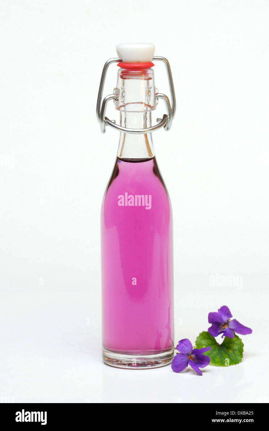 Violet sirup in bottle hi-res stock photography and images - Alamy