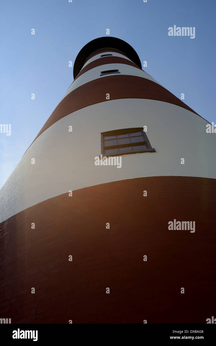The red and white striped Assateague Island Lighthouse is shown close ...