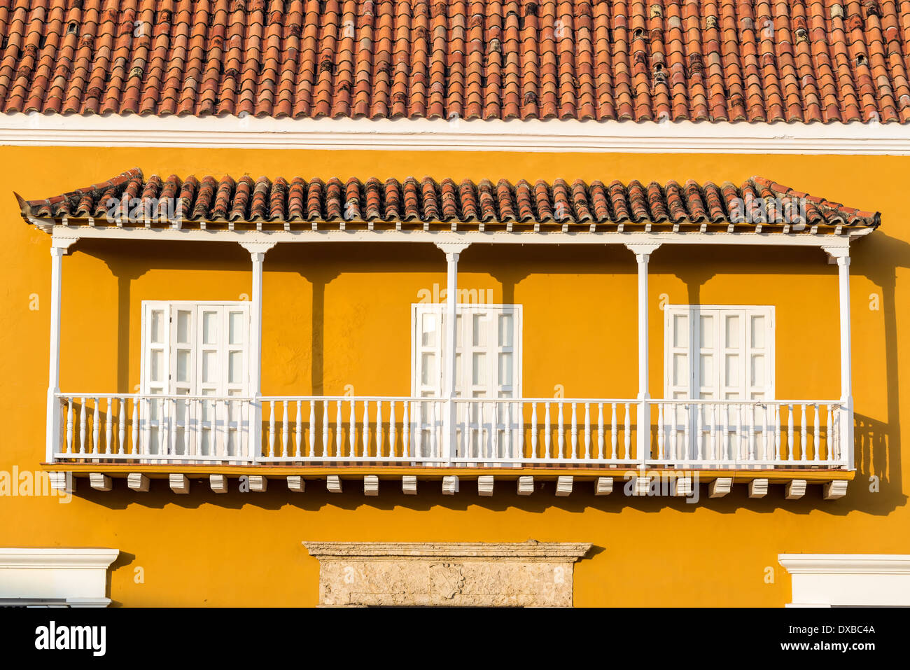 Historic yellow and white colonial balcony in the center of Cartagena ...