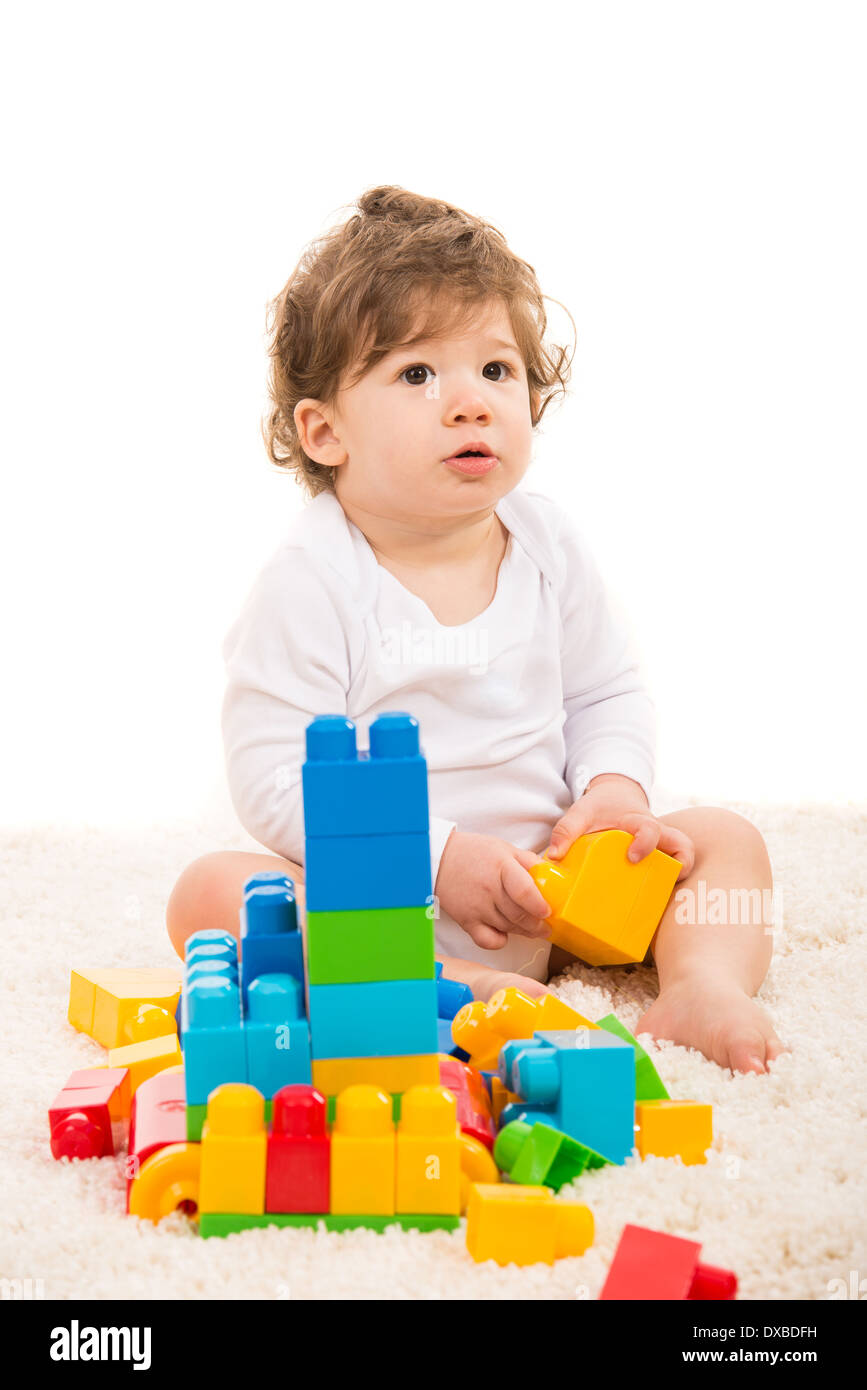 Baby boy stacking blocks hi-res stock photography and images - Alamy
