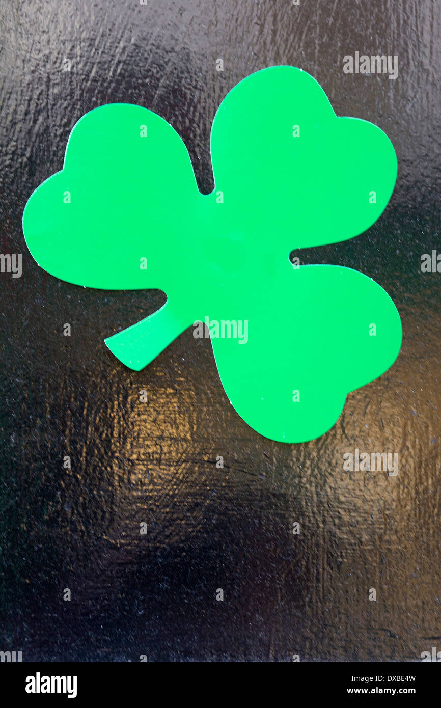 cardboard-shamrocks-on-a-public-house-window-in-london-england-stock
