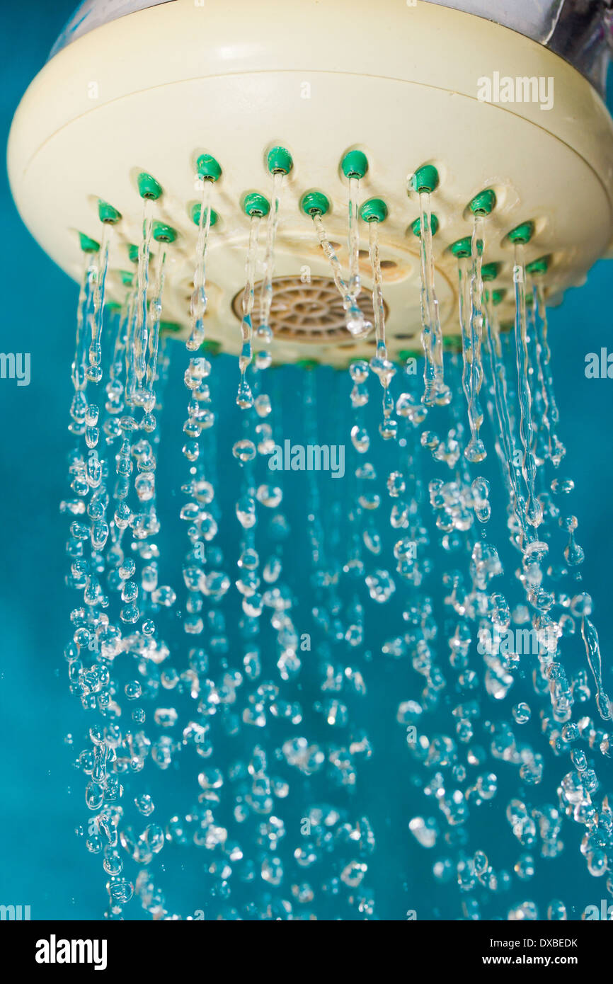 From a shower water in macro scale flows Stock Photo - Alamy