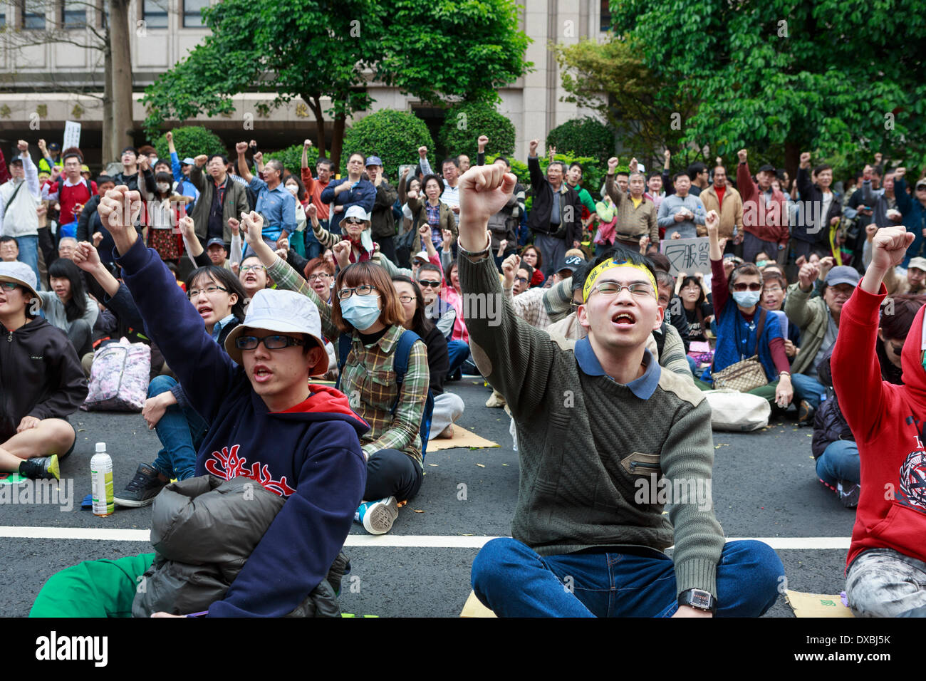 Taipei, Taiwan. 23rd Mar, 2014. An angry but peaceful crowd shout ...