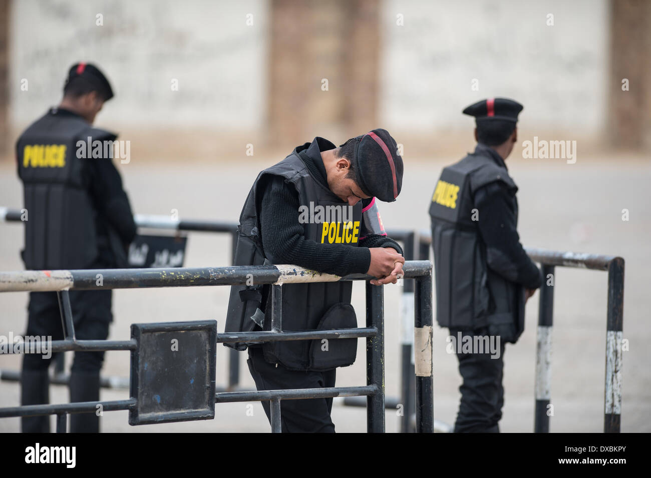 Cairo, Egypt. 23rd Mar, 2014. Egyptian policemen guard outside Cairo ...