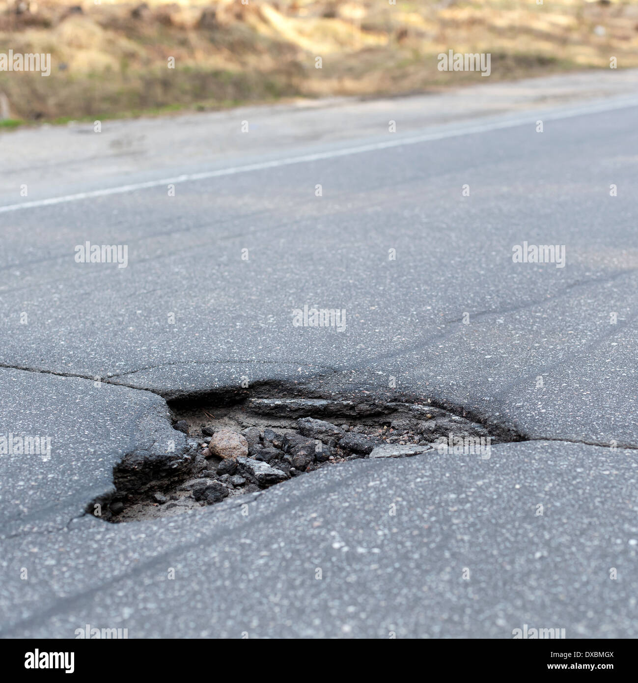 Hole in road asphalt hi-res stock photography and images - Alamy