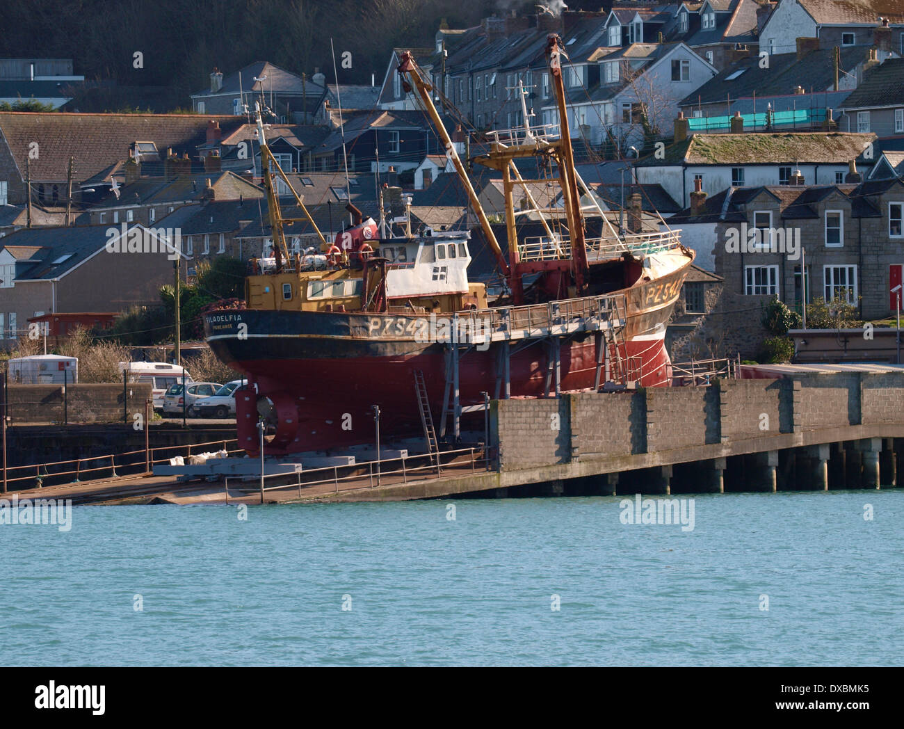 Fishing trawler in dry dock, Newlyn Harbour, Penzance, Cornwall, UK ...