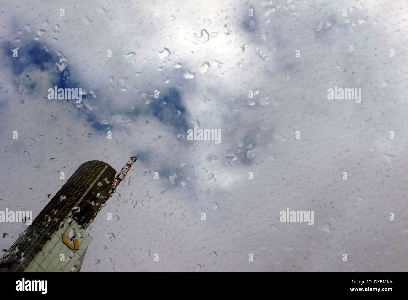 Highrise behind rainy window Stock Photo - Alamy
