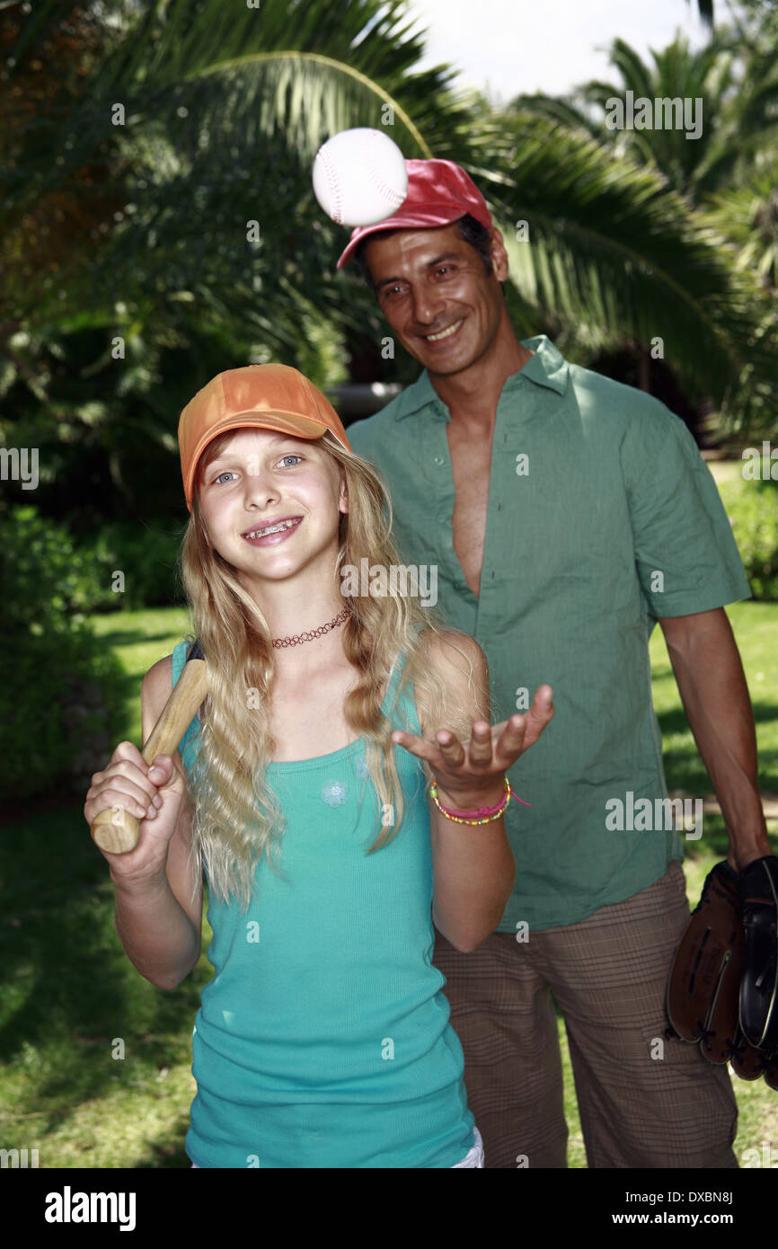 Father and daughter with baseball outfit Stock Photo - Alamy