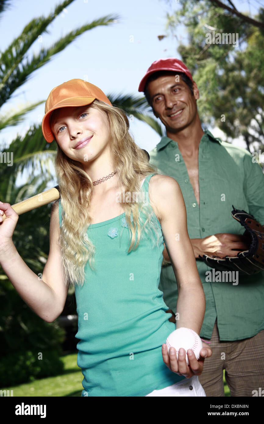 Father and daughter with baseball outfit Stock Photo - Alamy