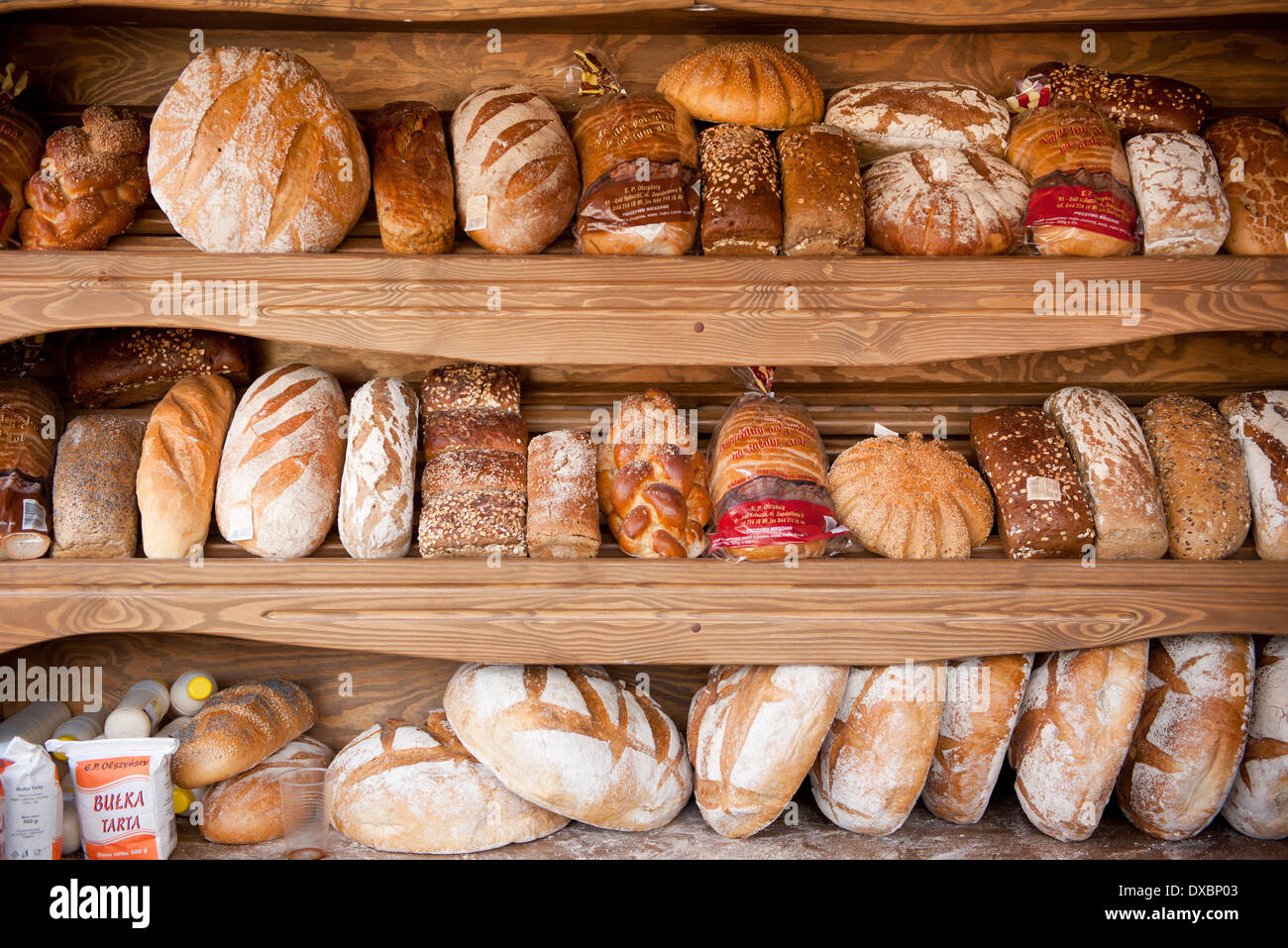 Presentation of bread variety on shelves Stock Photo - Alamy