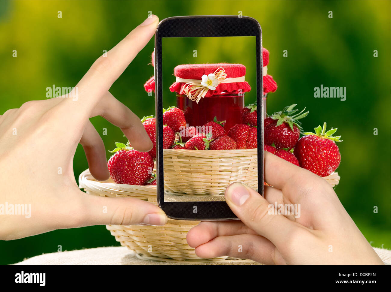 Man is taking photo of strawberries with smart mobile phone Stock Photo ...