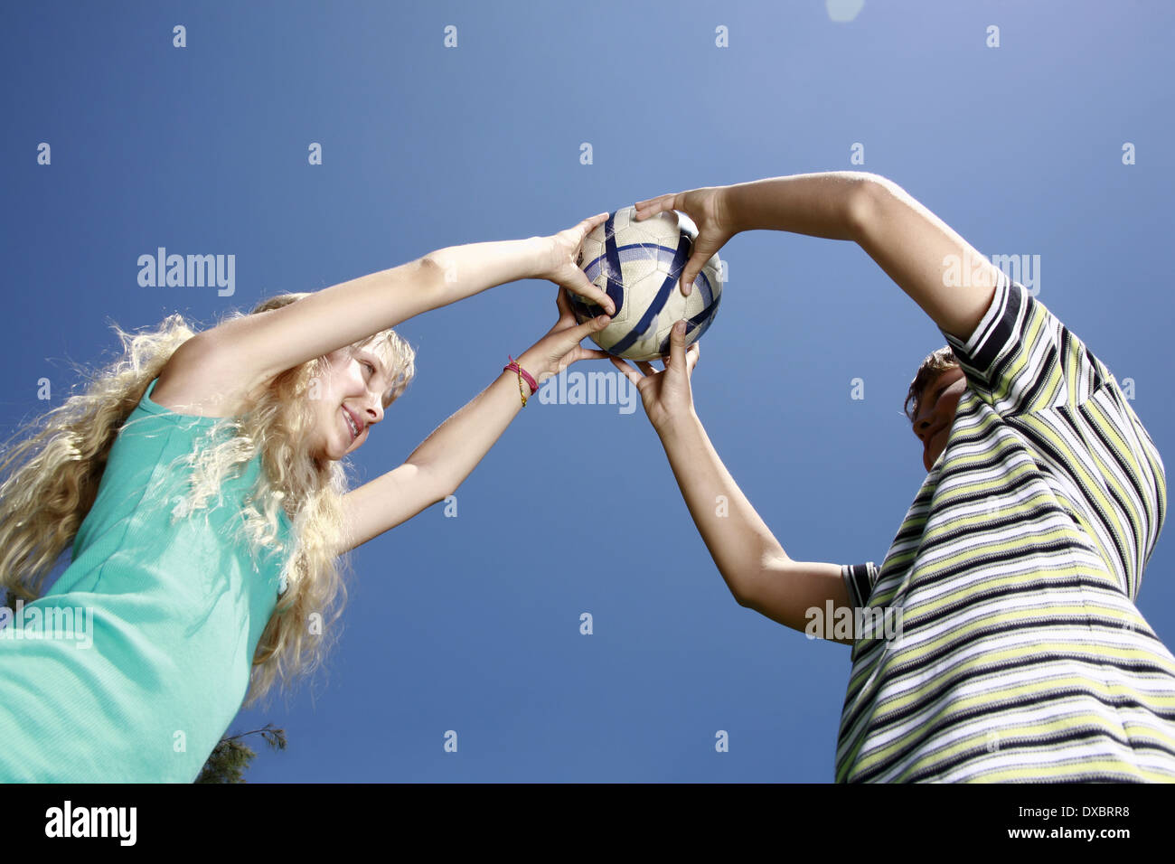 Blonde boy playing ball hi-res stock photography and images - Alamy