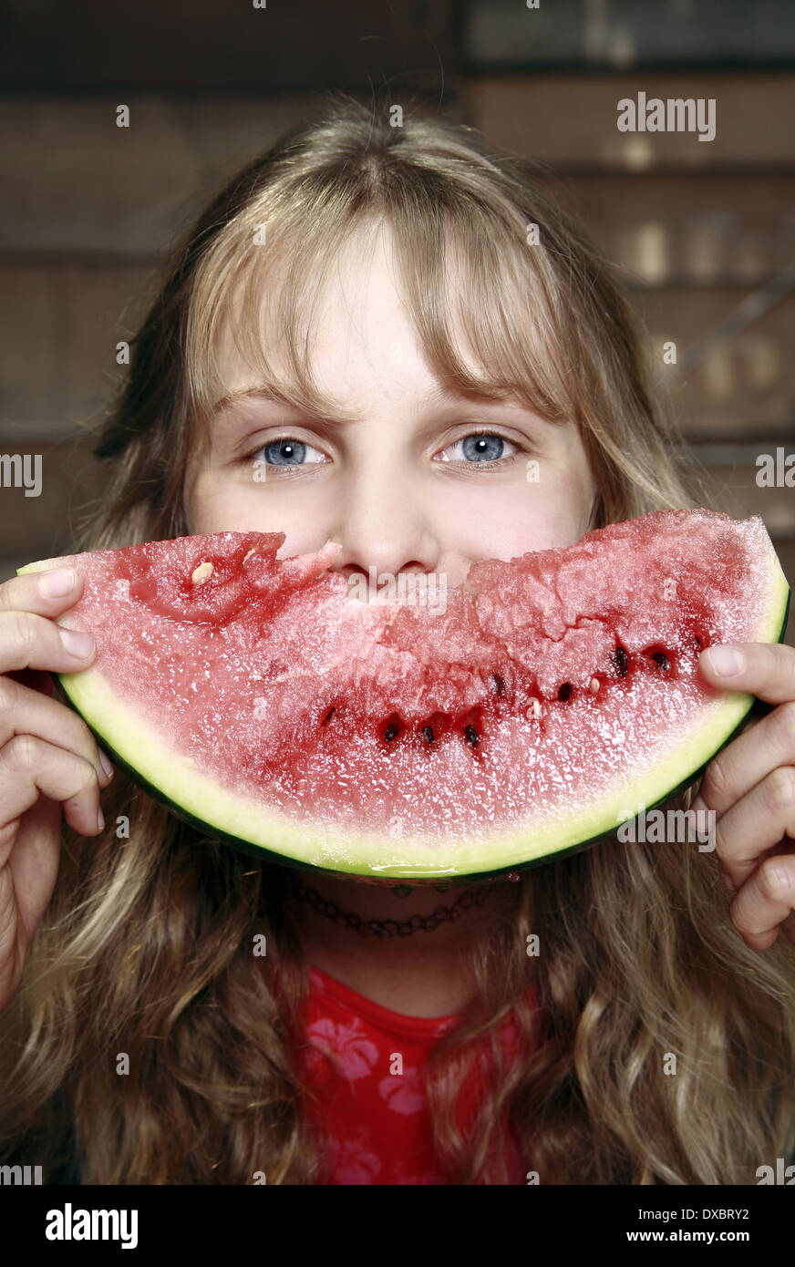 Girl posing with watermelon Stock Photo - Alamy