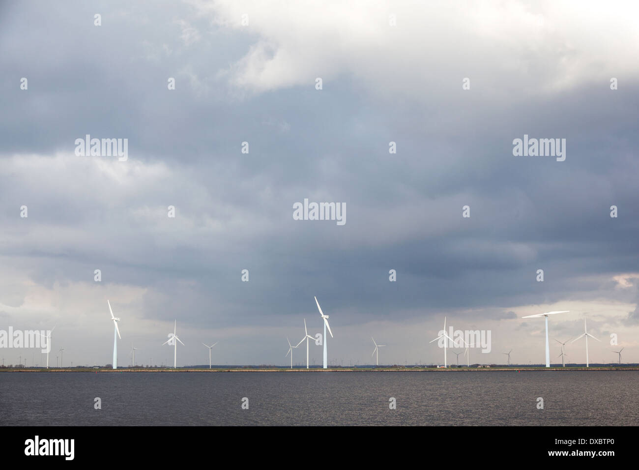 Windmills bright blue sky and clouds hi-res stock photography and ...