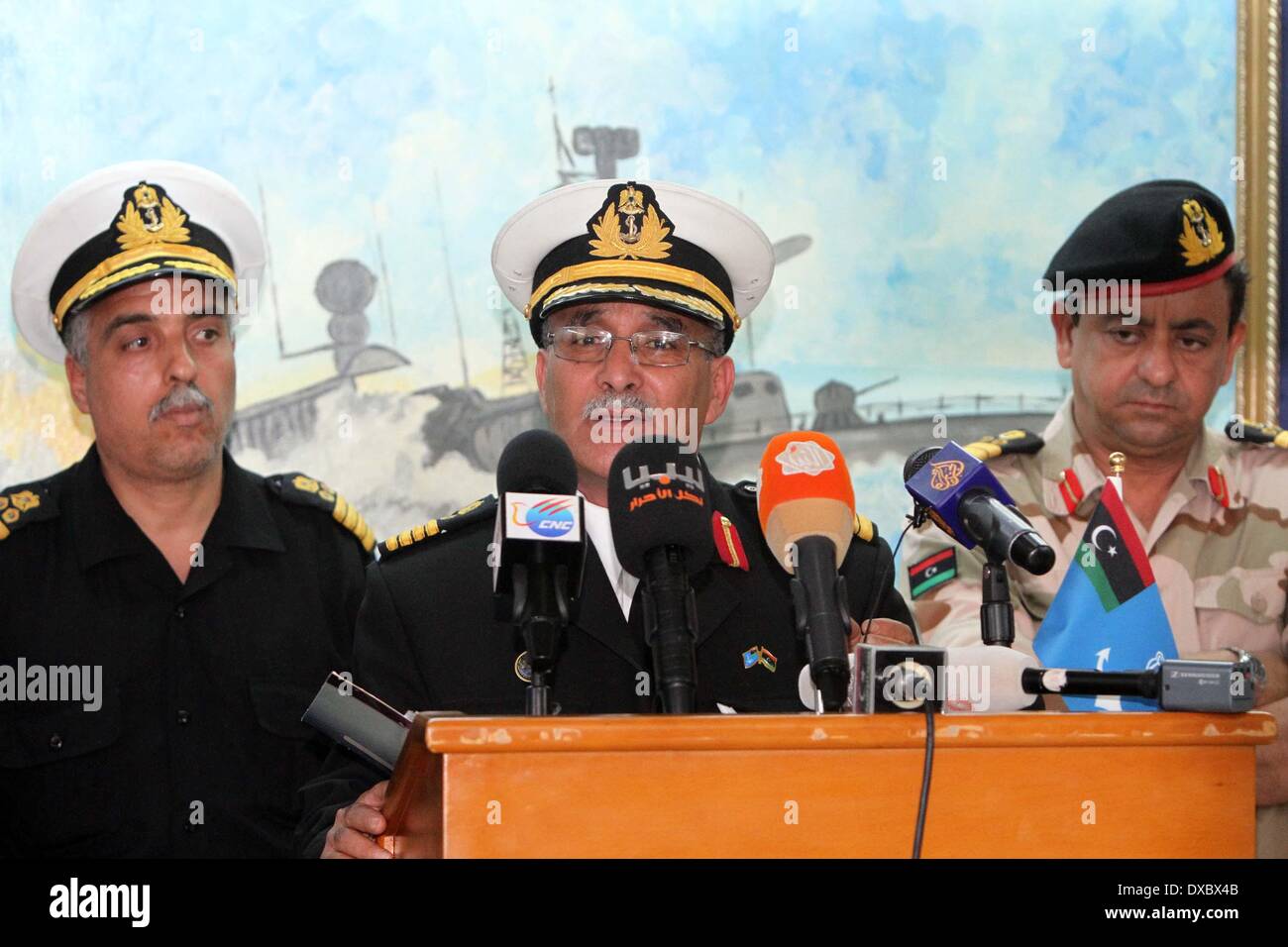 Tripoli, Libya. 23rd Mar, 2014. An officer from Libyan Navy addresses ...