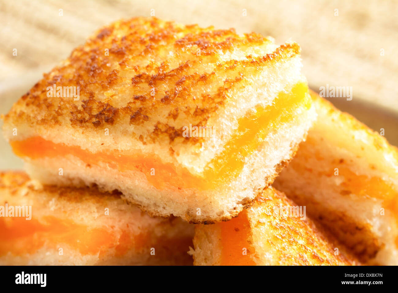 Mini grilled cheese appetizers with cheddar cheese Stock Photo - Alamy
