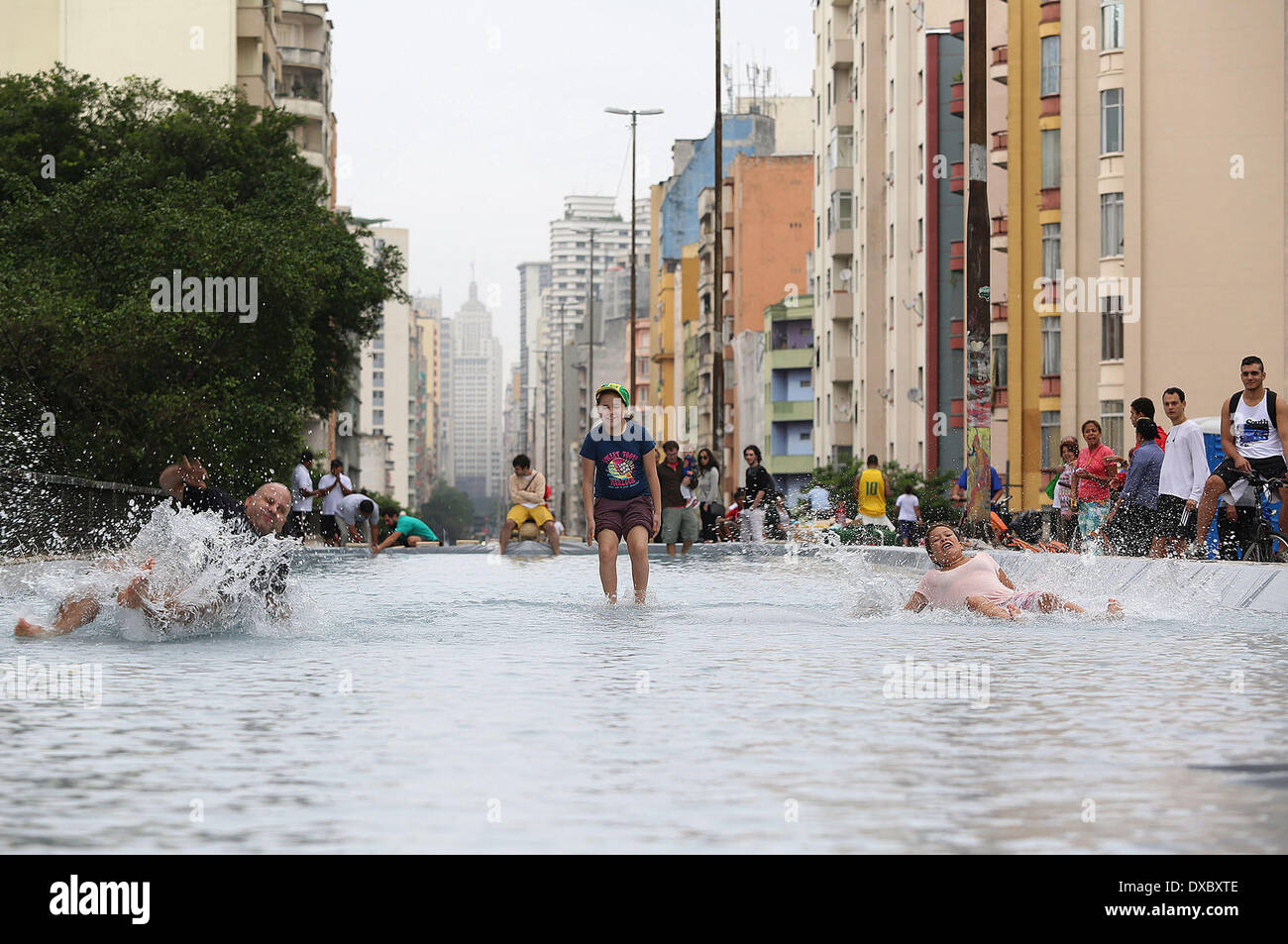 Sao Paulo, Brazil. 23rd Mar, 2014. People enjoy a swimming pool mounted ...