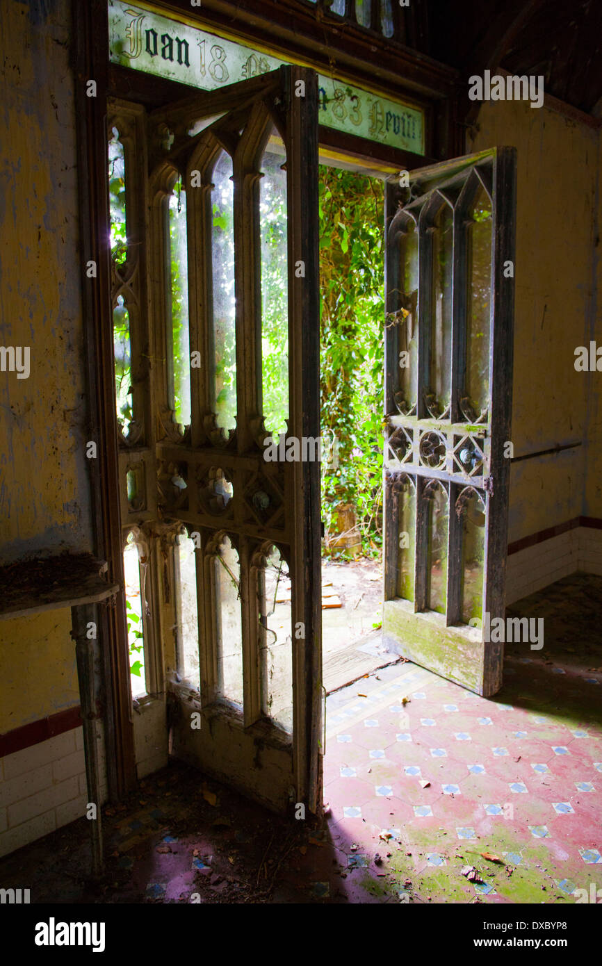 Old carved wooden doors on ruin Stock Photo - Alamy