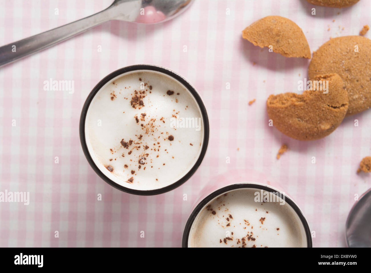 Cappuccino in pink cup with cocoa Stock Photo - Alamy