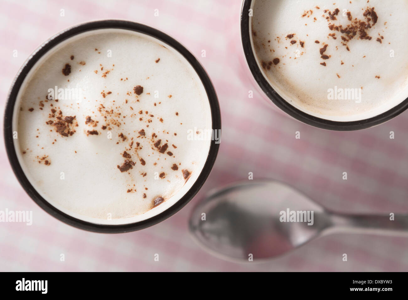 Cappuccino in pink cup with cocoa Stock Photo - Alamy