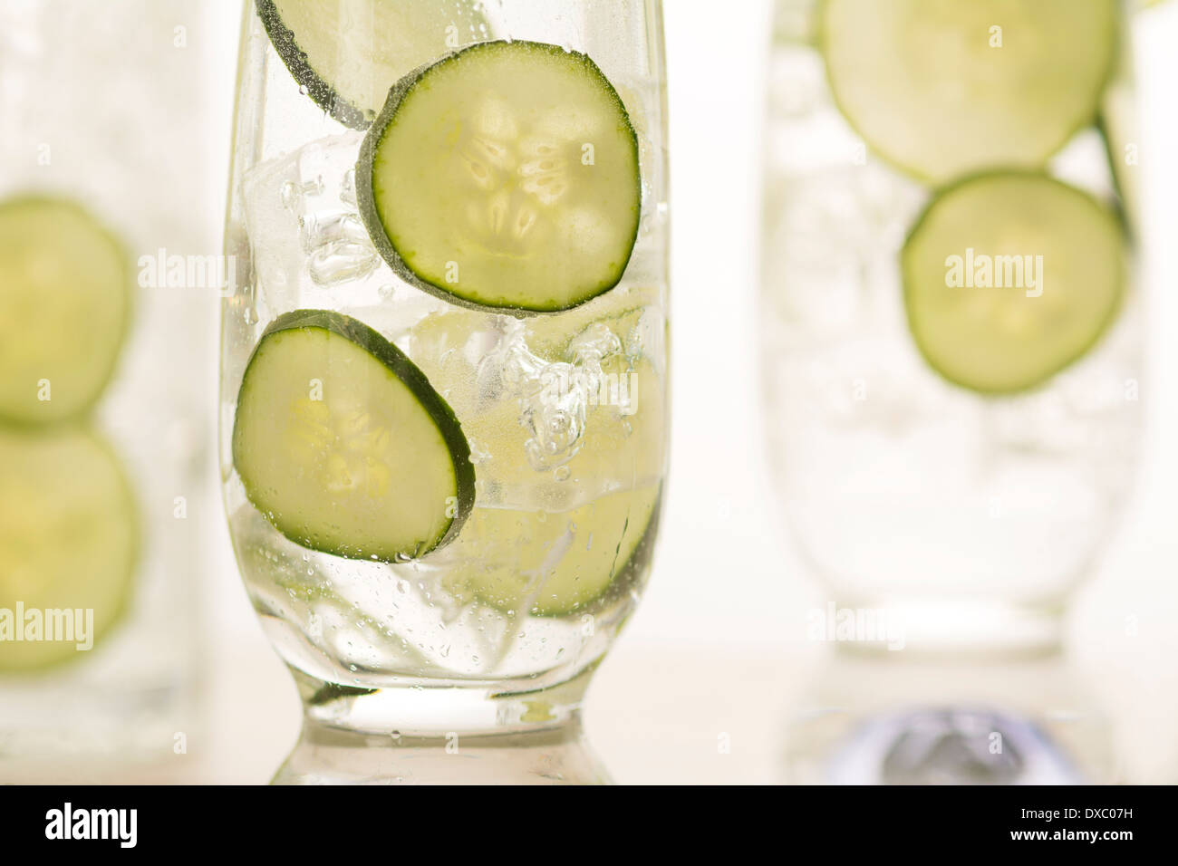 Cucumbers in cold water for refreshing summer drink Stock Photo - Alamy