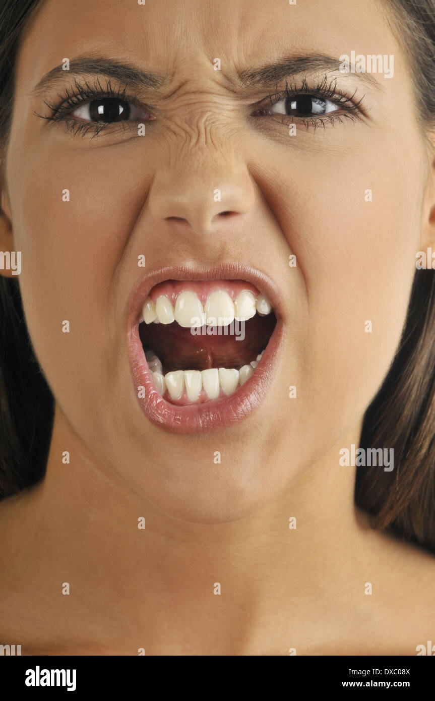 Female young adult face, shouting Stock Photo - Alamy