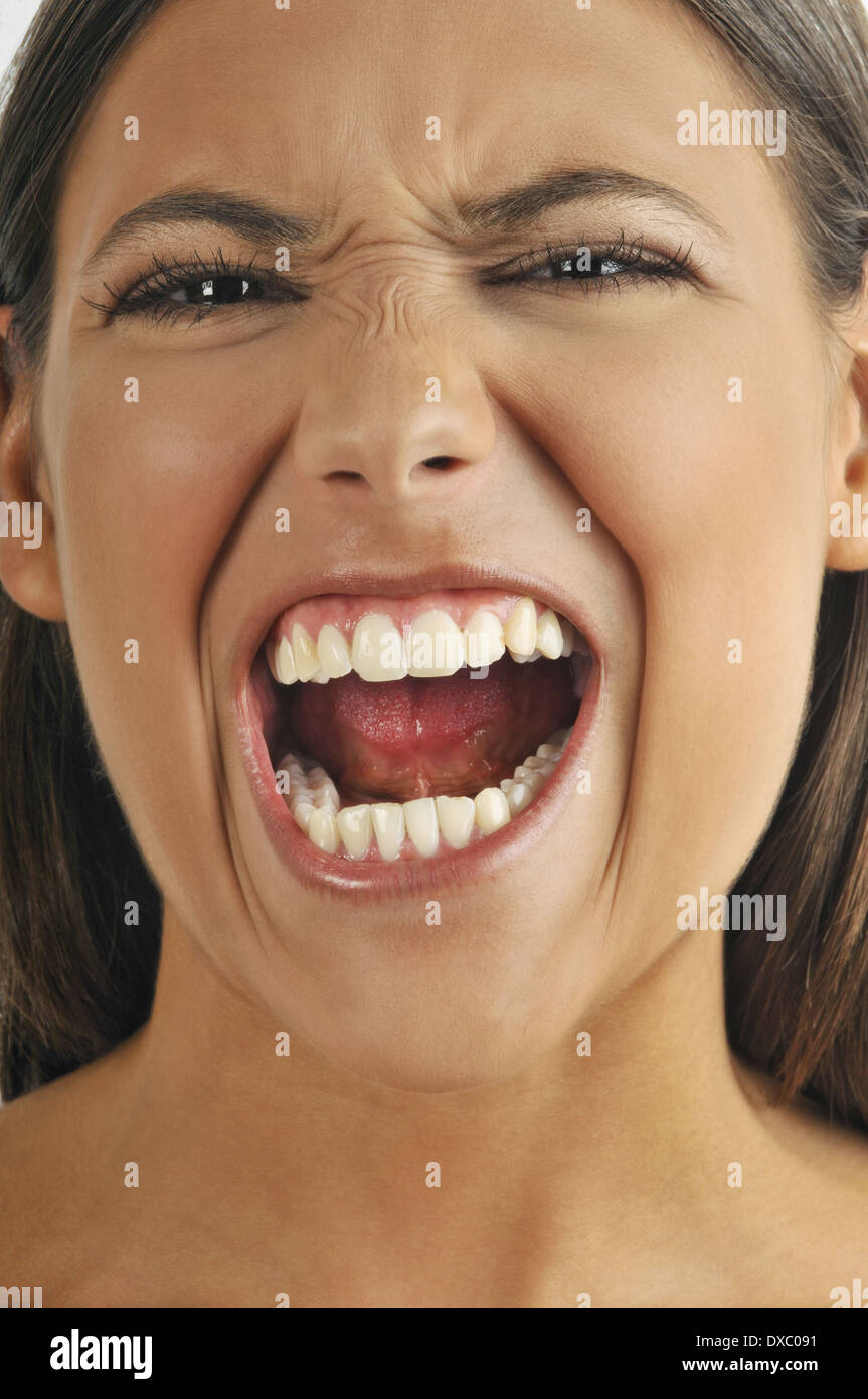 Female young adult face, shouting Stock Photo - Alamy
