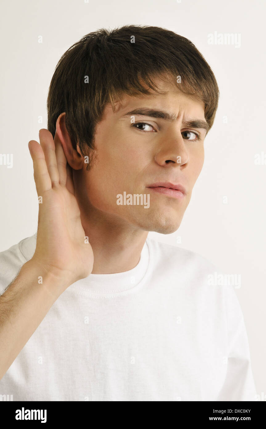 Straining to hear hi-res stock photography and images - Alamy