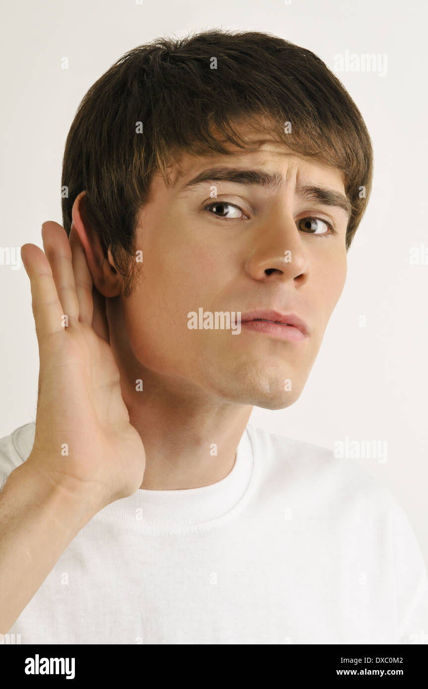 Straining to hear hi-res stock photography and images - Alamy