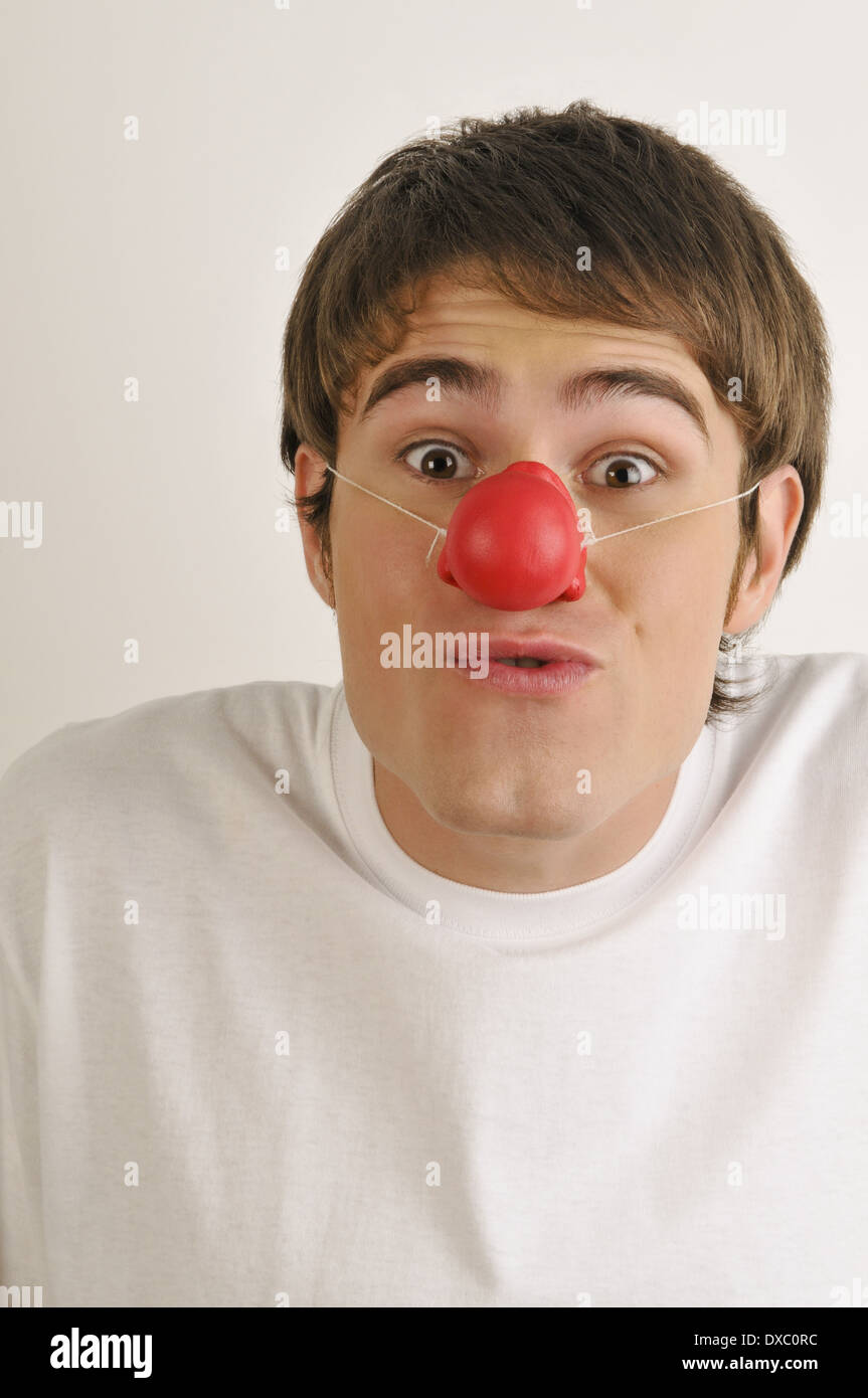Young male adult with false nose Stock Photo - Alamy