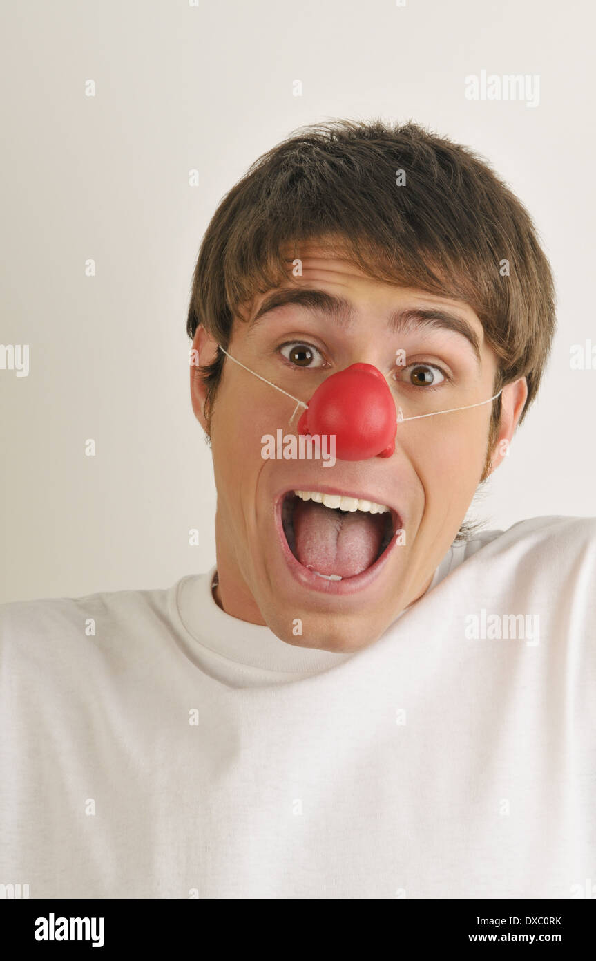 Young male adult with false nose Stock Photo - Alamy