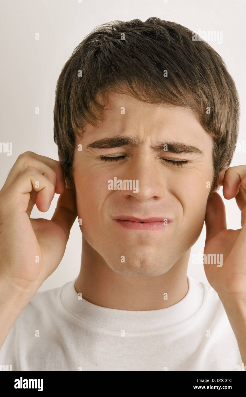 Holding ears hi-res stock photography and images - Alamy