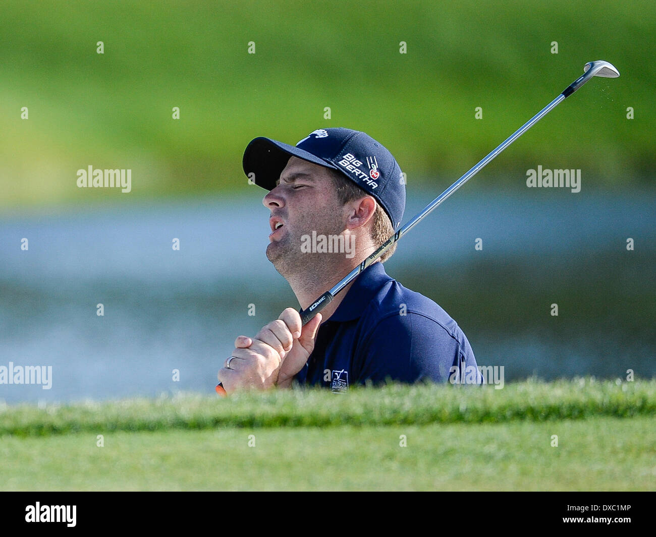 Orlando, Florida, USA. March 23, 2014. Matt Every reacts after almost ...