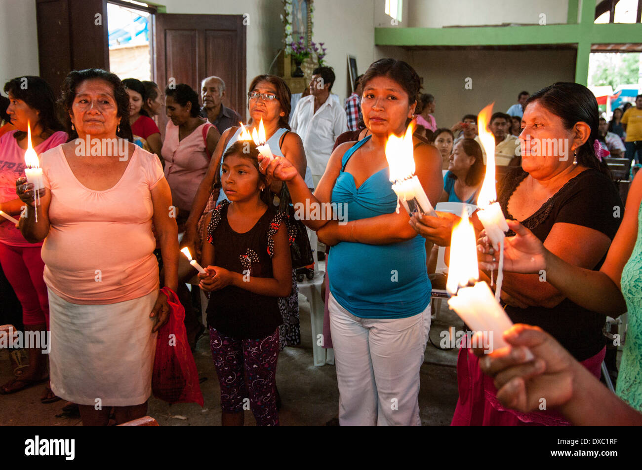 St. Stephen devout Christians praying in church. Yapatera, Piura. Peru ...