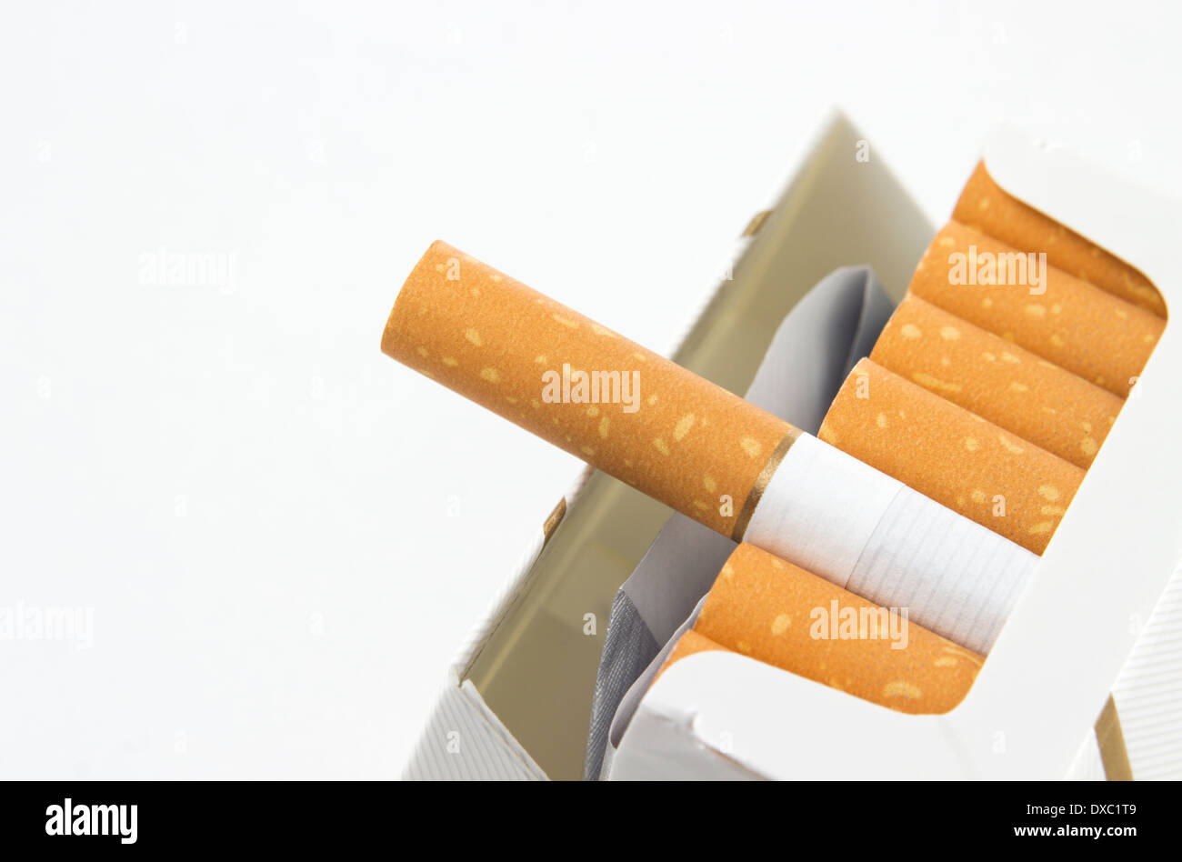 open cigarettes pack on white background Stock Photo - Alamy