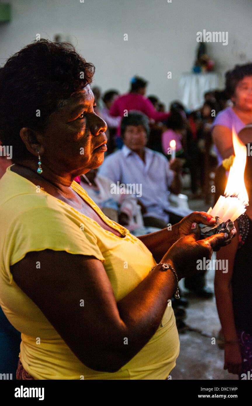 St. Stephen devout Christians praying in church. Yapatera, Piura. Peru ...
