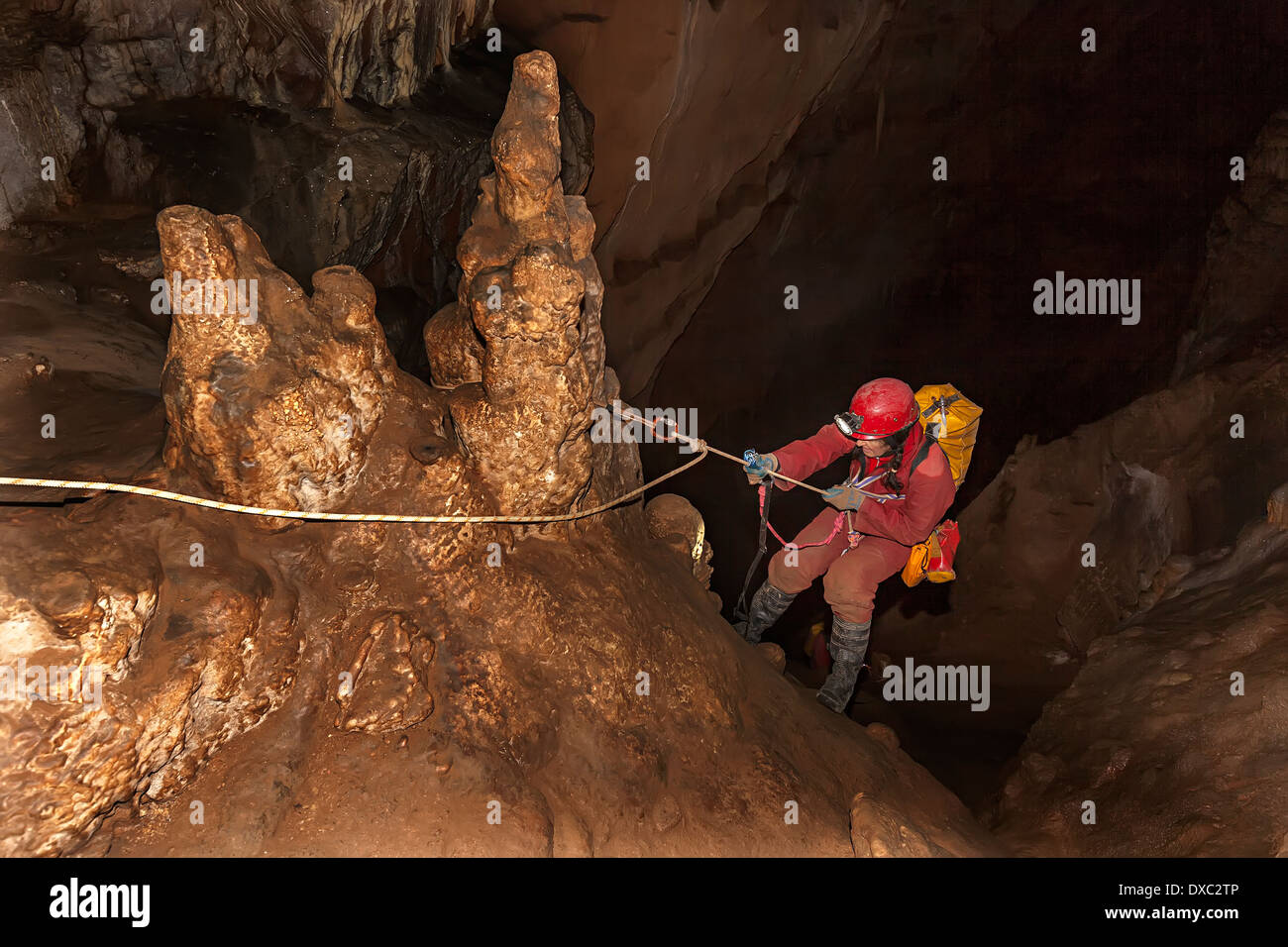 Woman caver on rope in hi-res stock photography and images - Alamy