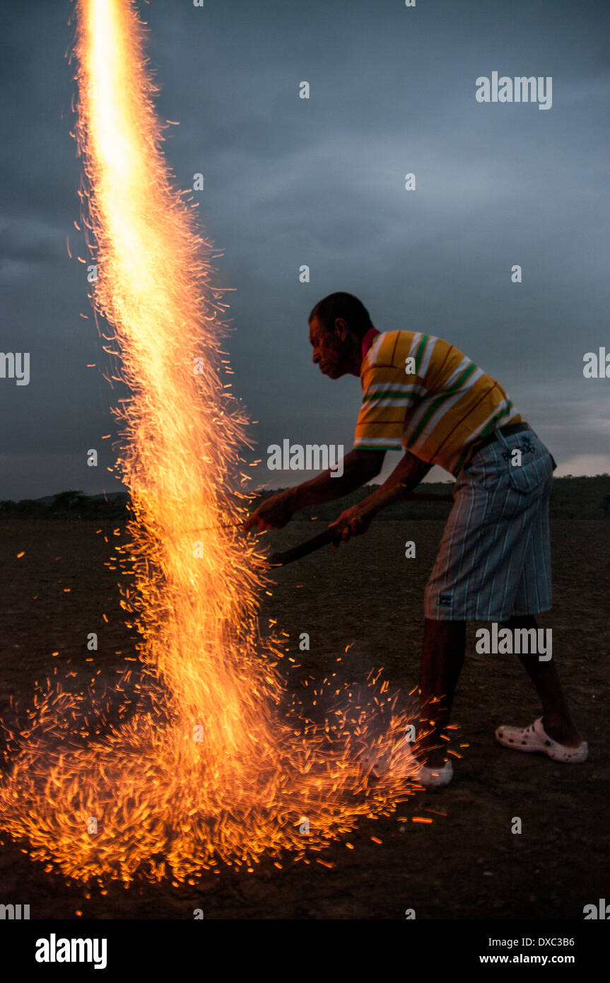 Man lighting fireworks Stock Photo - Alamy