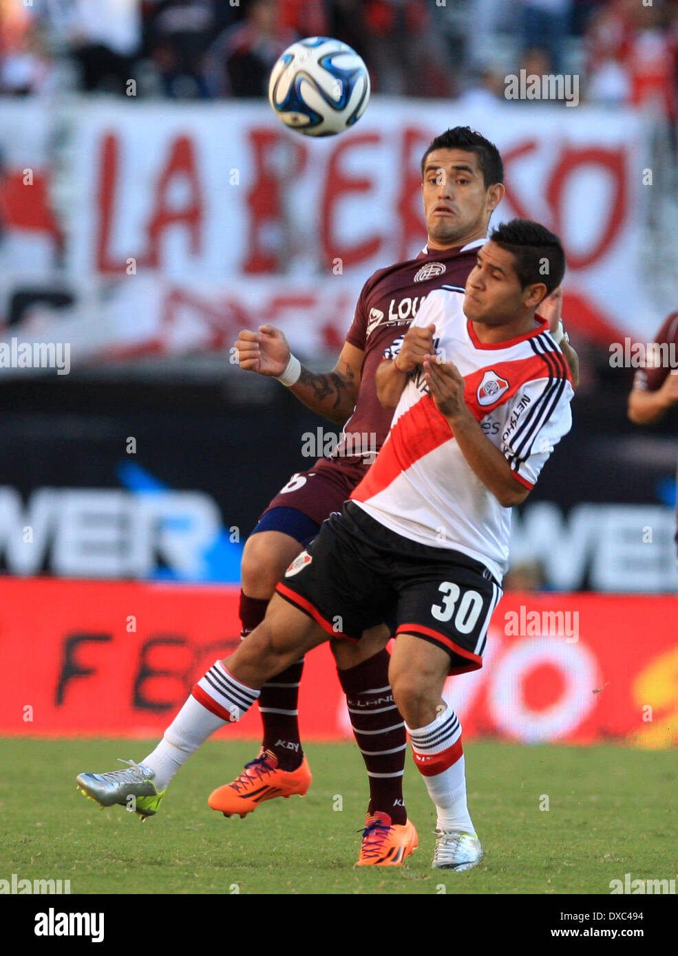 Buenos Aires, Argentina. 23rd Mar, 2014. Daniel Villalba (R) of River ...