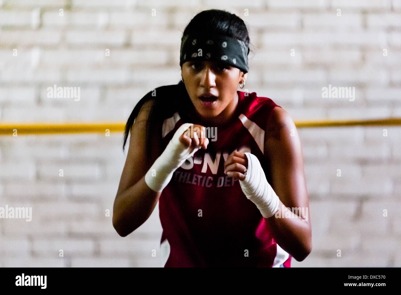 Geraldin Hamann, a young Colombian boxer, practices shadowboxing while ...