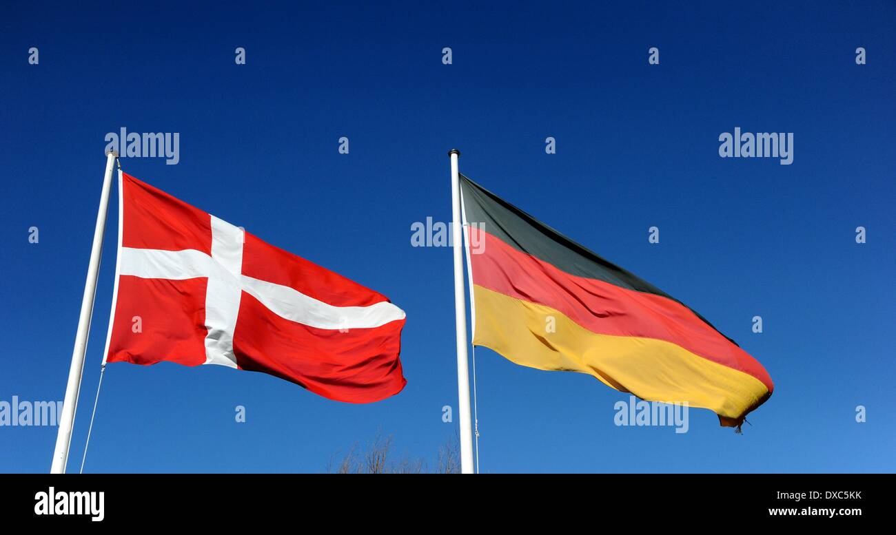 Flensburg, Germany. 20th Mar, 2014. The German and the Danish flag fly ...