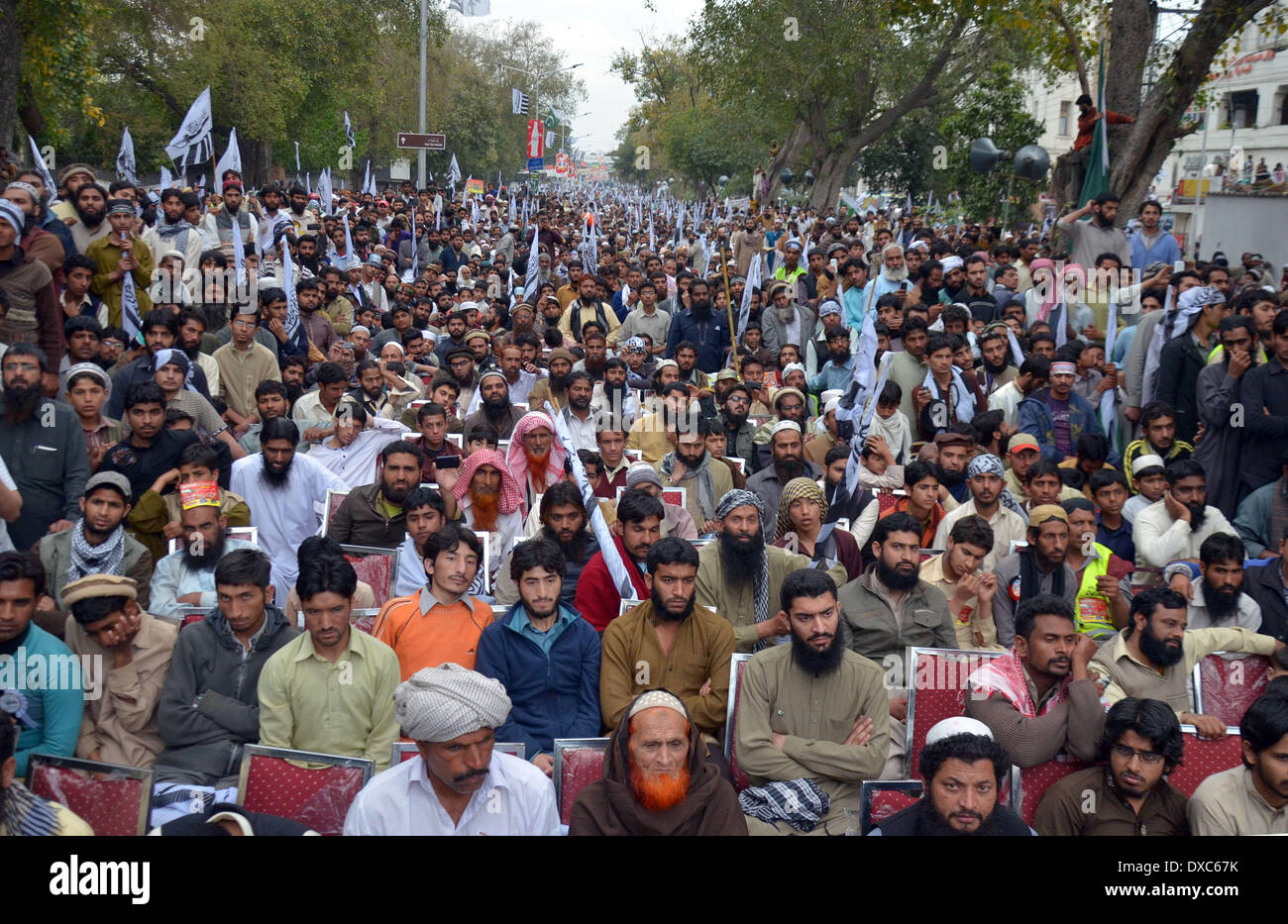 LAHORE, PAKISTAN – 23rd March 2014: Supporters of Pakistani religious ...