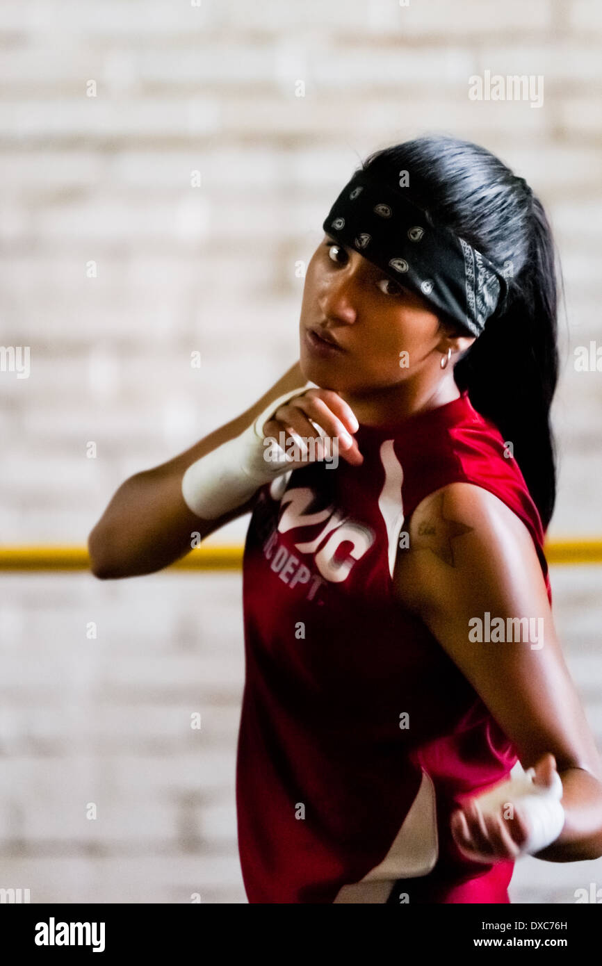 Geraldin Hamann, a young Colombian boxer, practices shadowboxing while ...