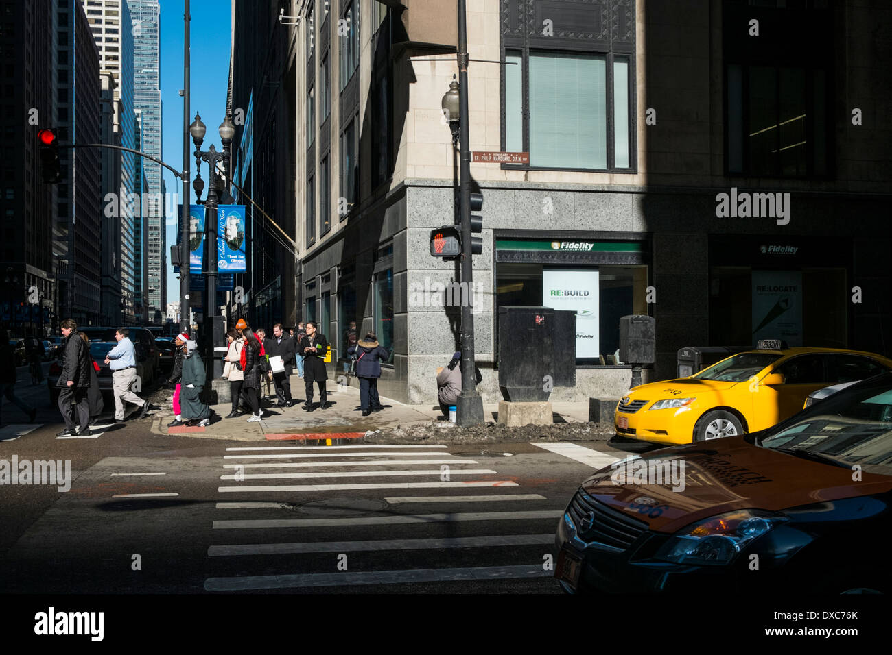 Pedestrians crossing street in the Loop downtown Chicago Illinois USA ...