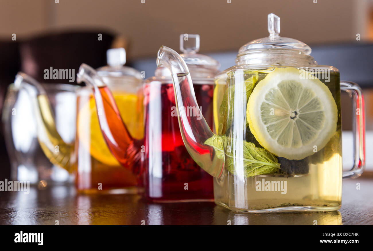 three square teapots with different colors fruit tastes of tea Stock ...