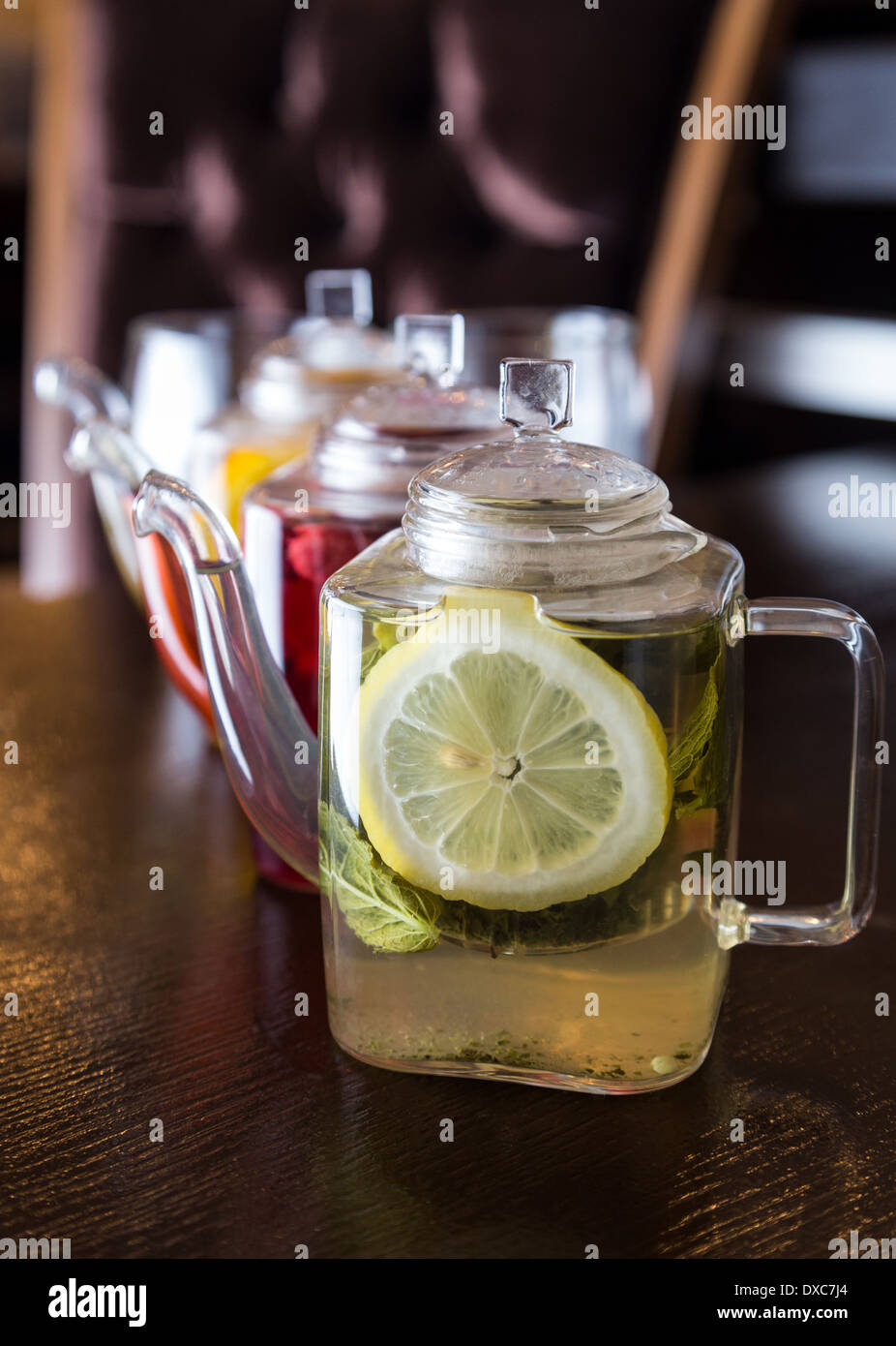 three square teapots with different colors fruit tastes of tea Stock ...
