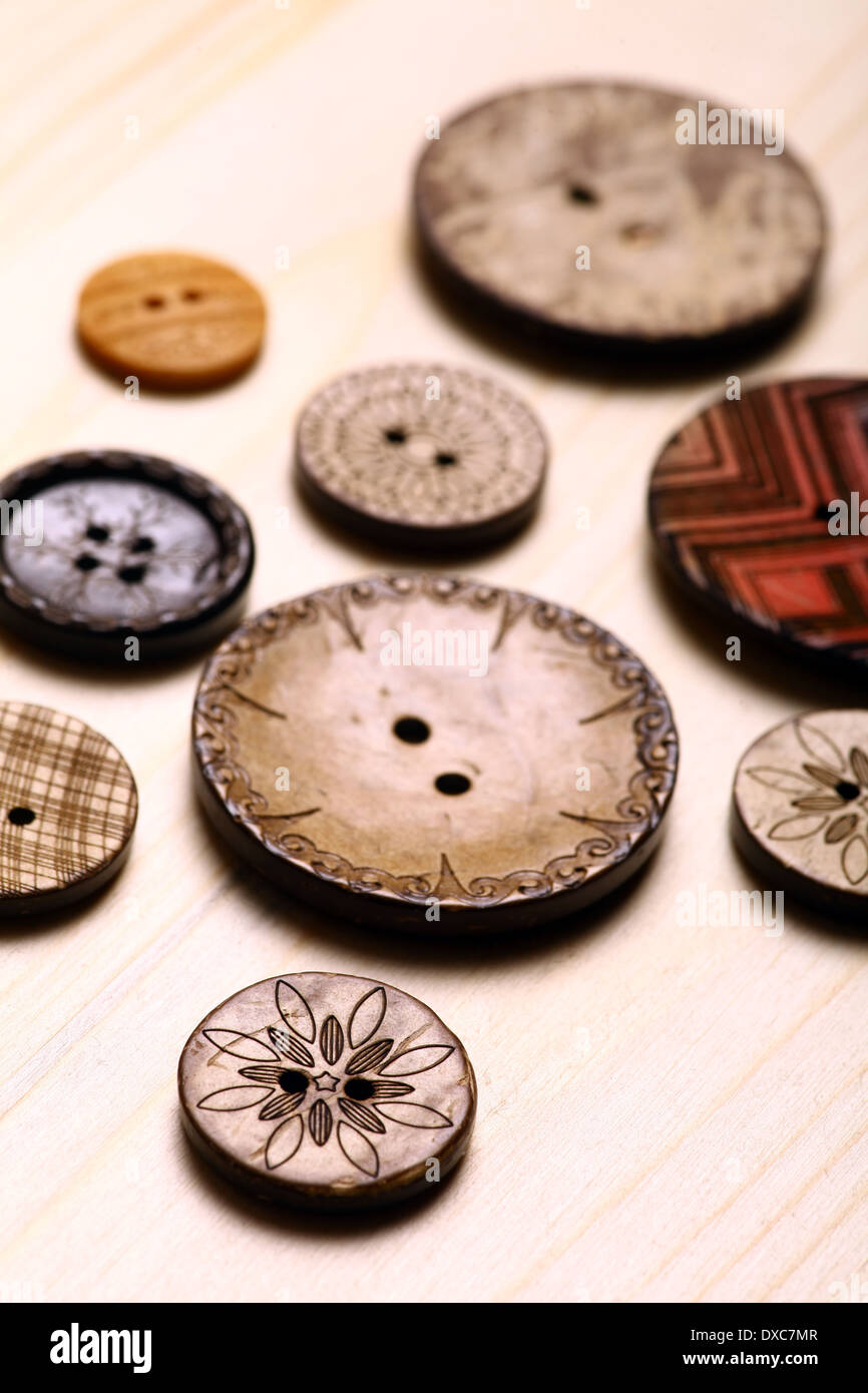 Close up color shot of some wooden buttons Stock Photo - Alamy