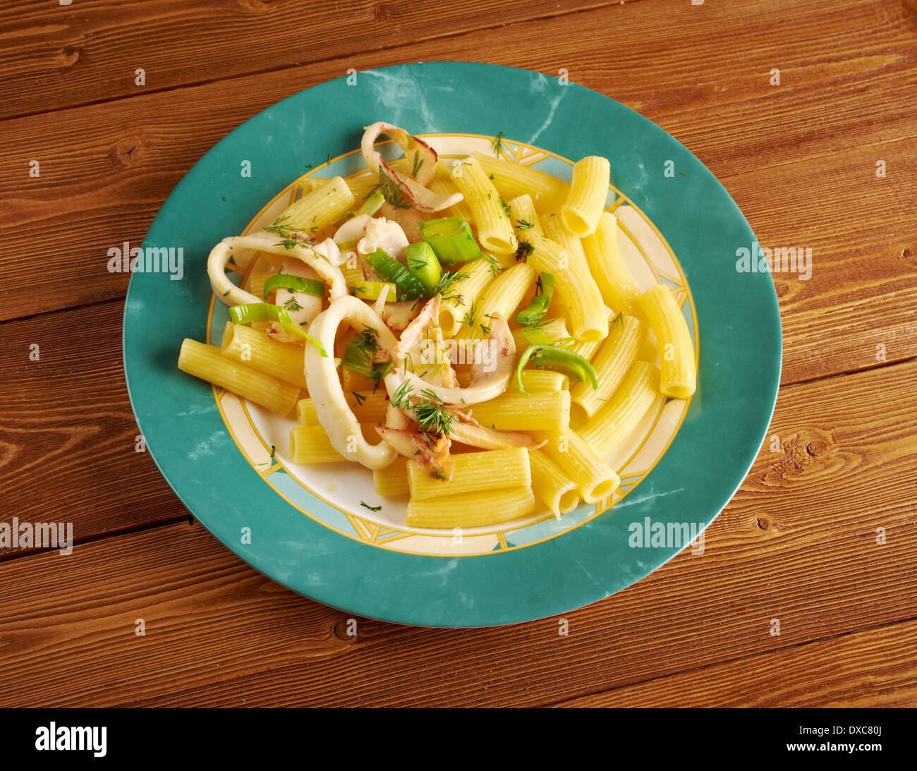 Seafood with Rigatoni Pasta.Eating Pasta in Italy Stock Photo - Alamy